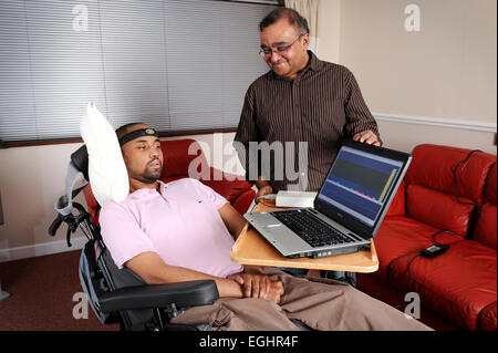 Richard Gregory has Locked-in Syndrome is pictured with a device which ...