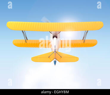 Yellow and blue biplane flying in the sky Stock Photo - Alamy