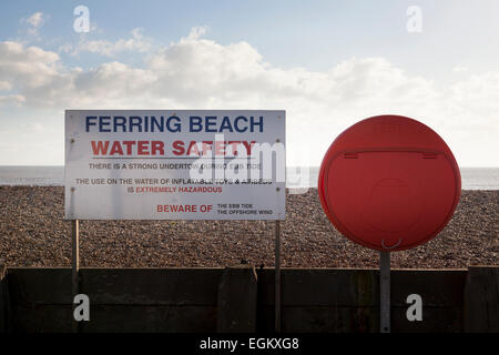 Lifebuoy and water safety sign by the beach at Ferring near Worthing ...
