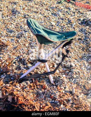 Three legged stool Stock Photo - Alamy