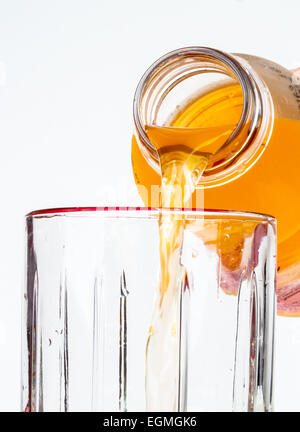 Pouring Colorful Energy or Fruit Drink Stock Photo - Alamy