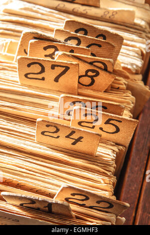 Archive file folders in drawer closeup toning Stock Photo - Alamy