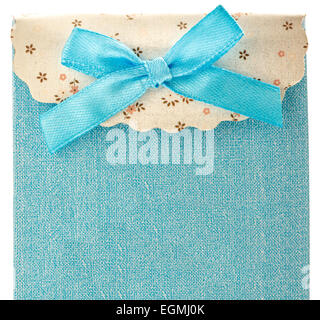 Gift container with bow on blue background holidays concept Stock Photo ...