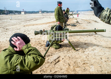 Cadets shoot a SPG recoilless gun during firing training with SPG ...
