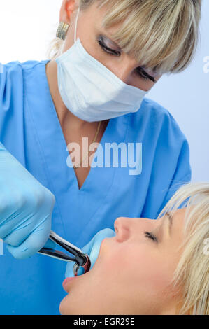 woman dentist pain torture forceps patient surgery painful doctor ...