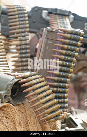 Belt of machine gun ammunition ready to feed to weapon Stock Photo - Alamy