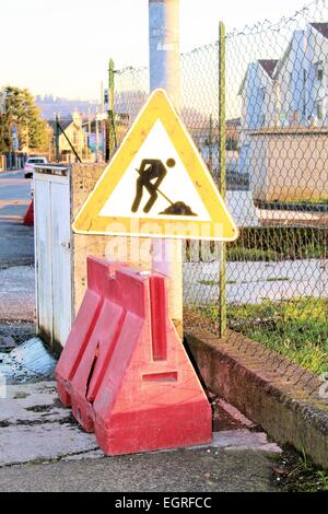 Closeup of a work in progress caution turn sign in Milan, Italy Stock ...