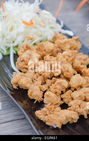 deep fried chicken tendons with fresh vegetable and chili sauce, asian ...