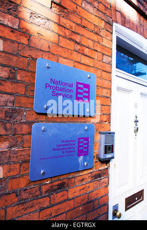 National Probation Service sign on brick wall Stock Photo - Alamy