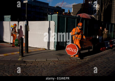 Construction site Banksman (Traffic Marshal) waits to control local ...