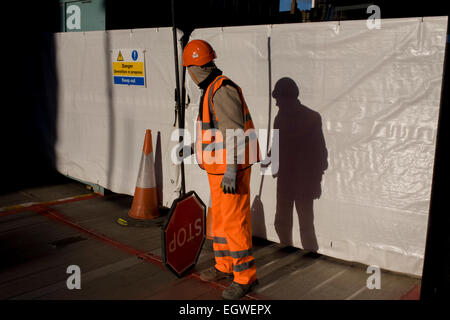 Construction site Banksman (Traffic Marshal) waits to control local ...