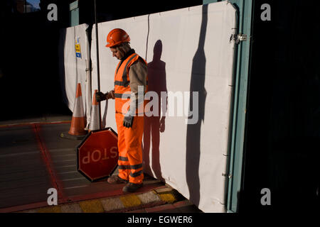 Construction site Banksman (Traffic Marshal) waits to control local ...