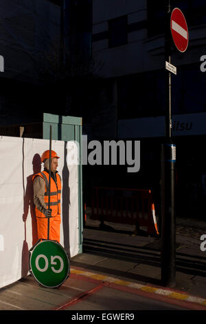 Construction site Banksman (Traffic Marshal) waits to control local ...