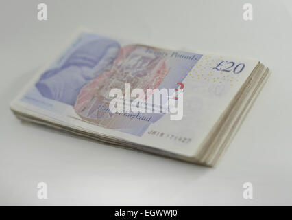 £1000 in £20 notes. A stack of 50 Twenty pound notes making a grand in ...