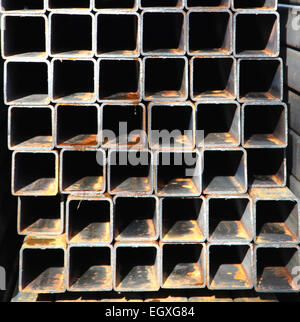 Square profile iron in a warehouse Stock Photo - Alamy