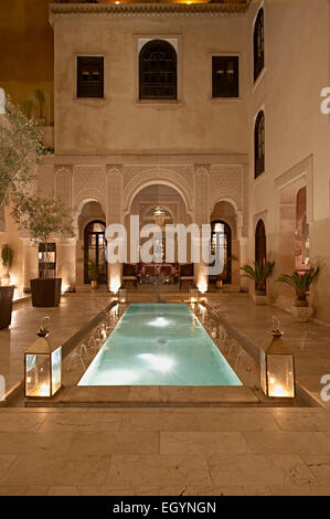 Morocco, Fes, Hotel Riad Fes, swimming pool at sunlight Stock Photo - Alamy