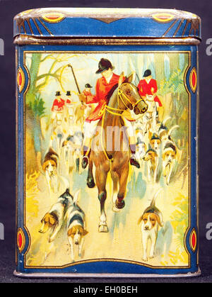 This tin features images of a fox hunt, reflecting the traditional ...