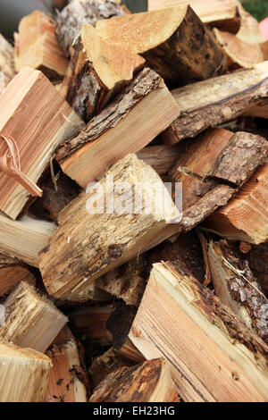 Log pile, split logs Stock Photo - Alamy