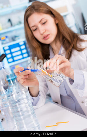 Lab assistant testing water quality Stock Photo - Alamy