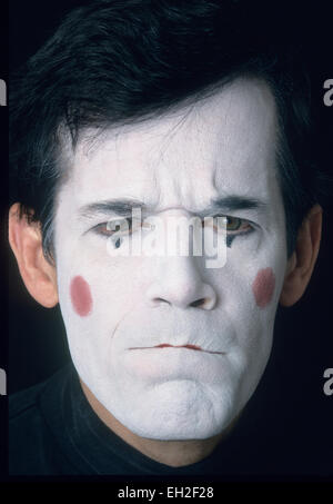 Mime, male, in white face, displaying fear or sadness Stock Photo - Alamy