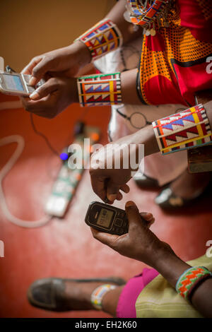 Massai using a mobile phone Stock Photo - Alamy