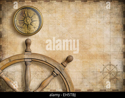 Old vintage retro golden compass on ancient map Stock Photo - Alamy