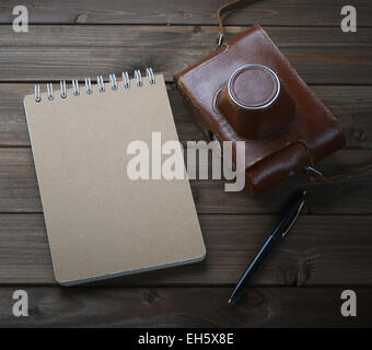 Fountain pen on a notebook. Wooden table. Copy space Stock Photo - Alamy