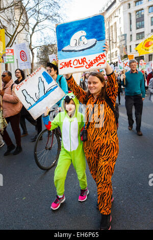 Activists march at a climate protest during the COP30 U.N. Climate ...