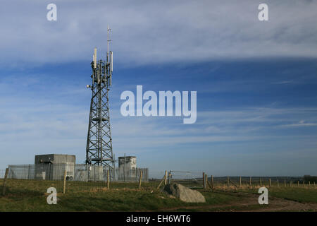Cell phone relay tower. Metal mast. Metal structure with mounted relays ...