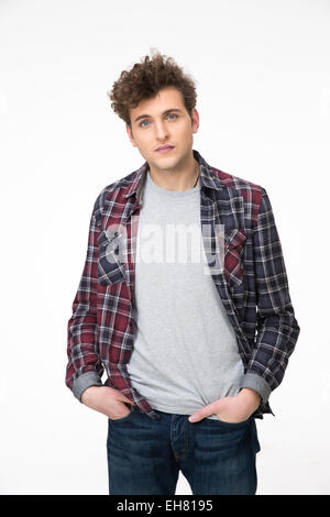 Handsome young man standing over isolated background smiling in love ...