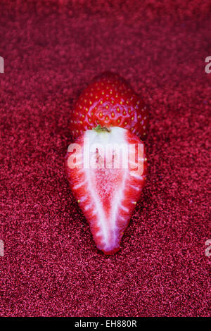 Open strawberry on gold glittery background full of bokeh Stock Photo ...