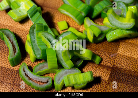 Cutted spring onions on a cutting board Stock Photo - Alamy