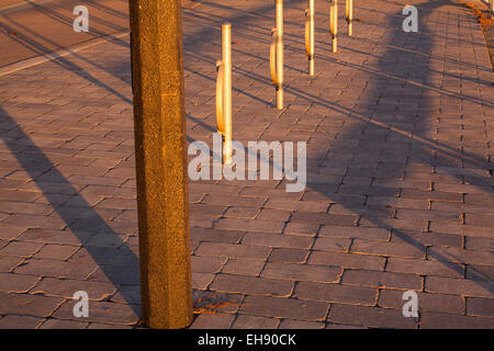 Shadows of bicycle racks Stock Photo - Alamy