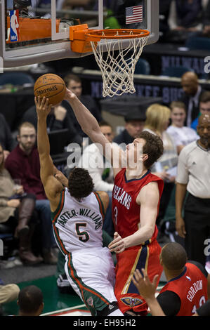 New Orleans Pelicans center Omer Asik (3) shoots over Milwaukee Bucks ...