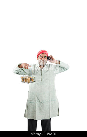 1 indian man Tea Servant Selling Tea Stock Photo - Alamy