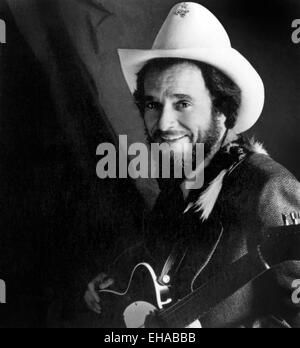 Country music singer Merle Haggard, left, is greeted by President ...