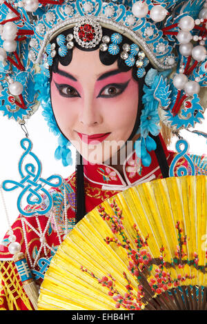 Female Peking Opera performer with a folding fan Stock Photo - Alamy