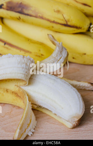 Fresh bananas on wooden background Stock Photo - Alamy