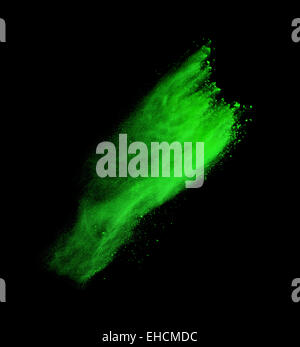 abstract green dust explosion on black background.abstract green powder ...