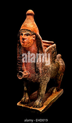 Sphinx this vase is shaped like an Egyptian sphinx with a haircut. He ...