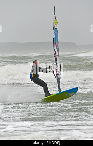 Surfing at Rhosneighr Anglesey North Wales UK Stock Photo - Alamy