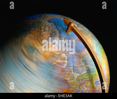 Spinning blue globe Stock Photo - Alamy