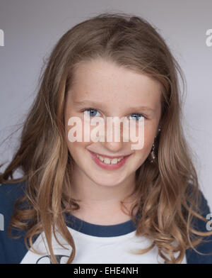 10 year old girl smiling with fun spectacles Stock Photo - Alamy