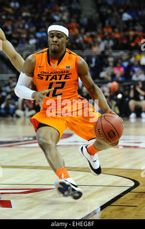Oklahoma State guard Anthony Hickey Jr. answers a question during an ...