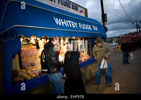 Goths buying fudge at Whitby Goth Weekender Stock Photo - Alamy