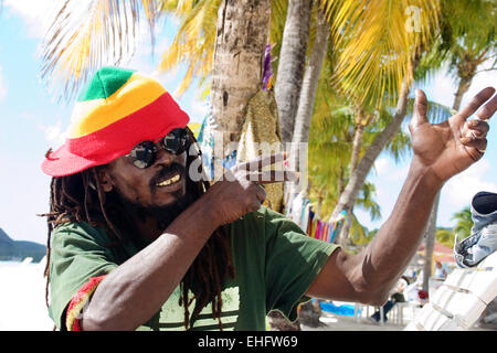 Rasta man on Jolly beach Antigua Stock Photo - Alamy