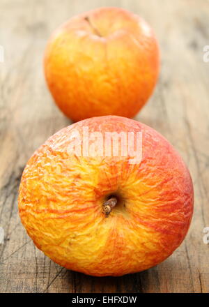 Two shriveled apples Stock Photo - Alamy
