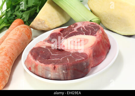 vegetable soup with beef leg Stock Photo - Alamy