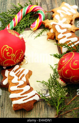 Beautiful Christmas composition with candy cane, gift, cones and cookie ...