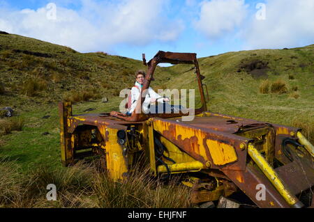 Woman driving old JCB digger on farmland on the Pennine Way Stock Photo ...